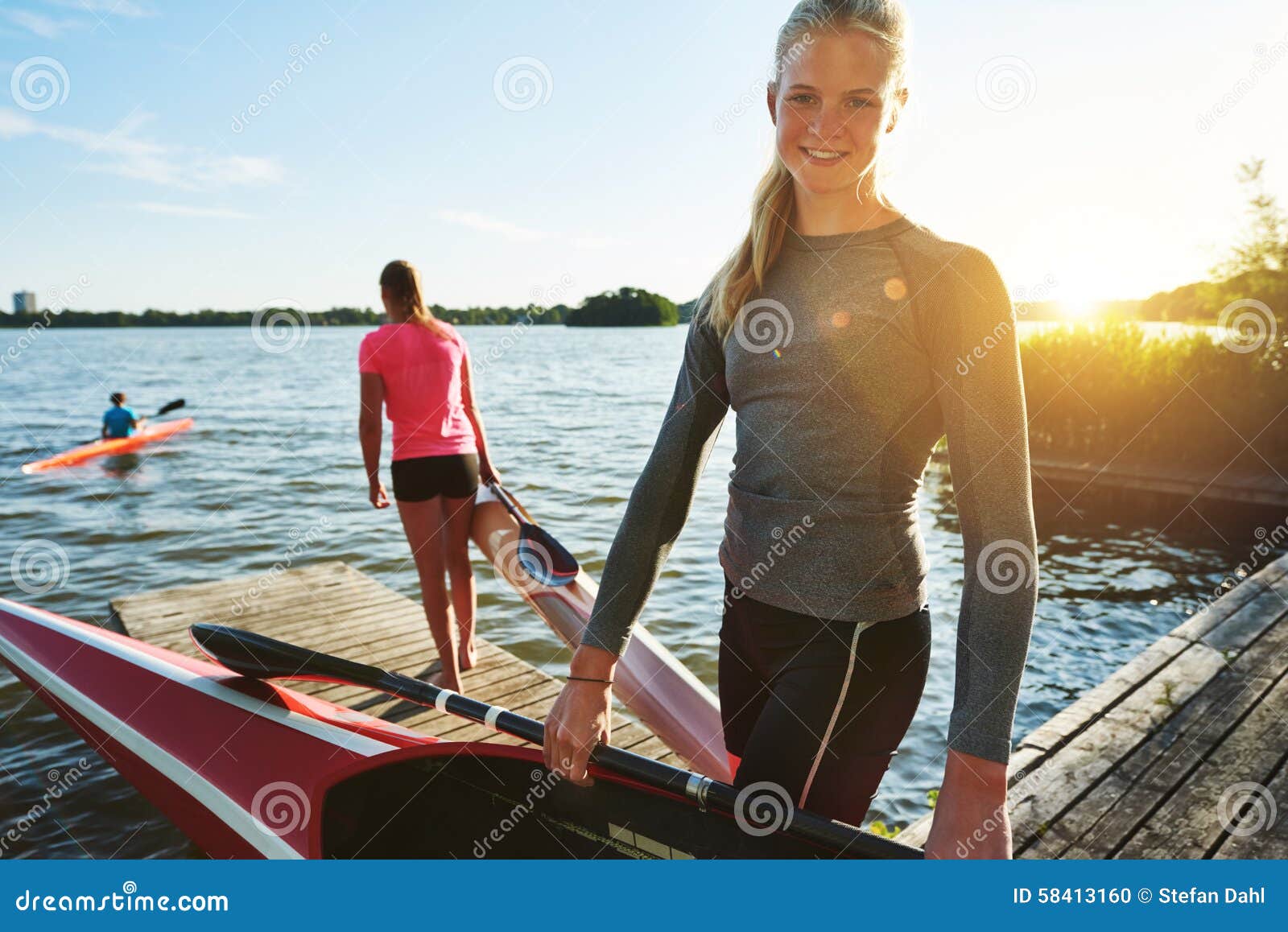 Fit woman with a kayak stock photo. Image of charismatic - 58413160