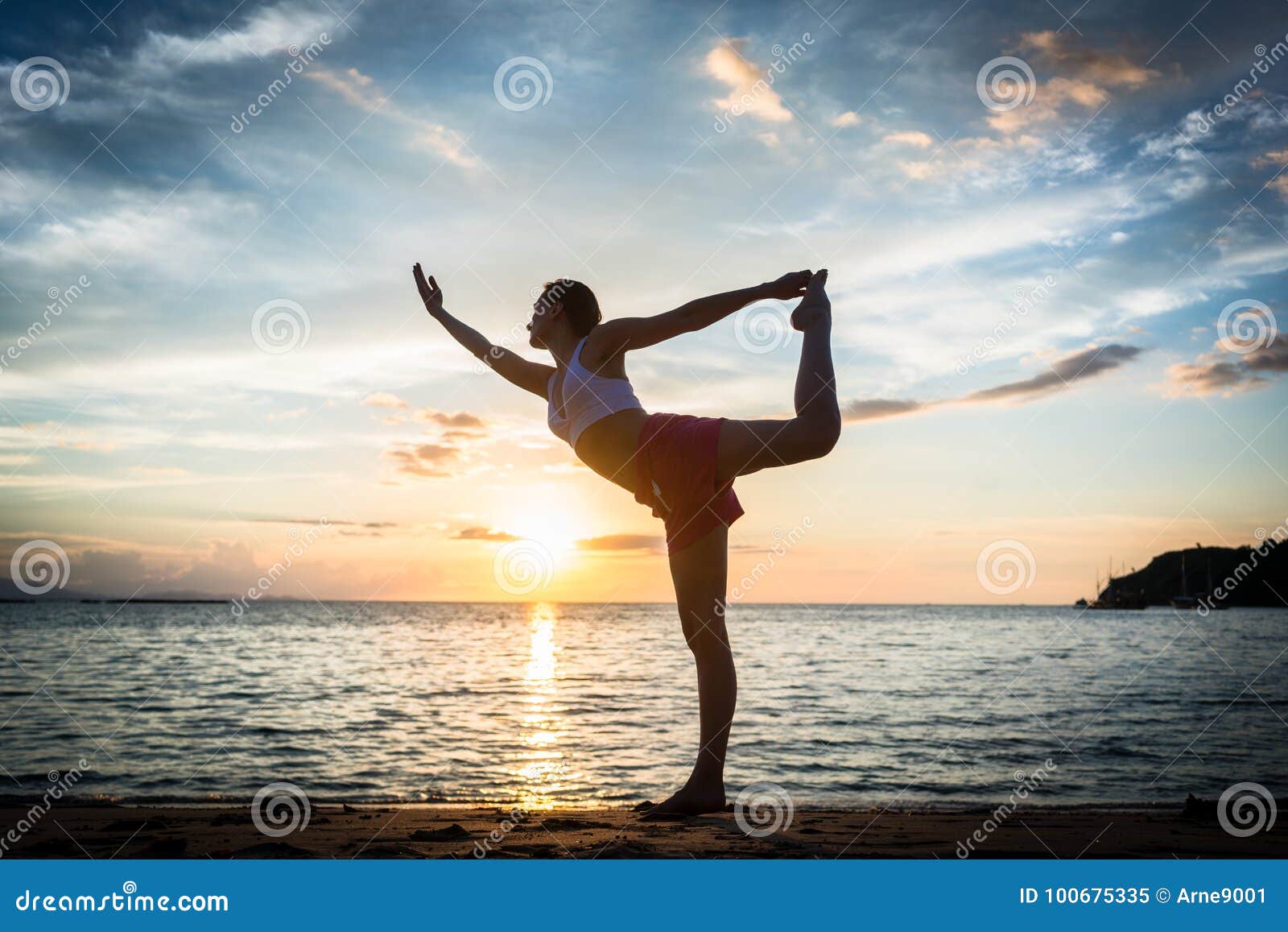 Fit Woman Practicing on the Beach the Standing Bow Pulling Pose Stock ...