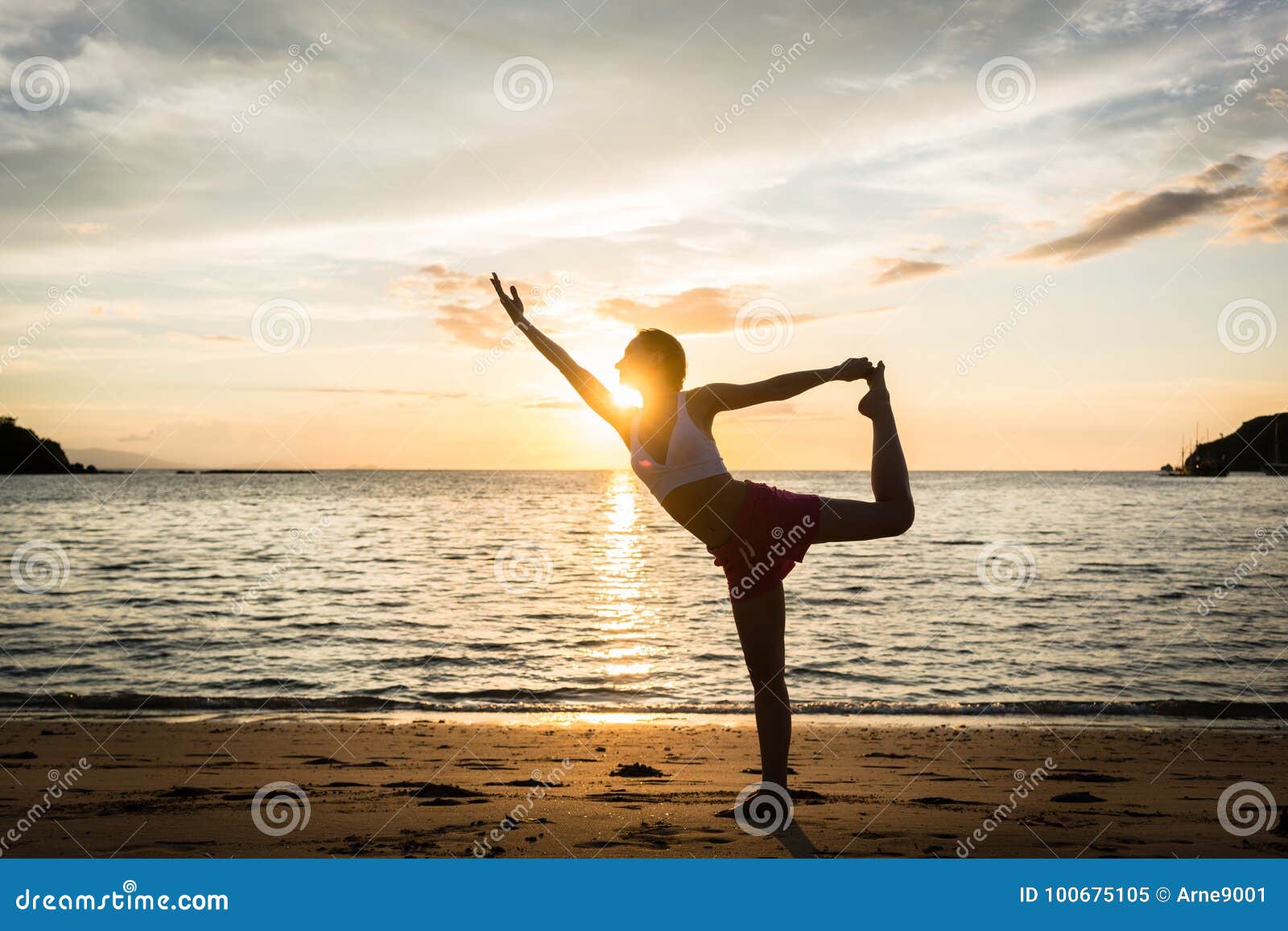 Fit Woman Practicing on the Beach the Standing Bow Pulling Pose Stock ...