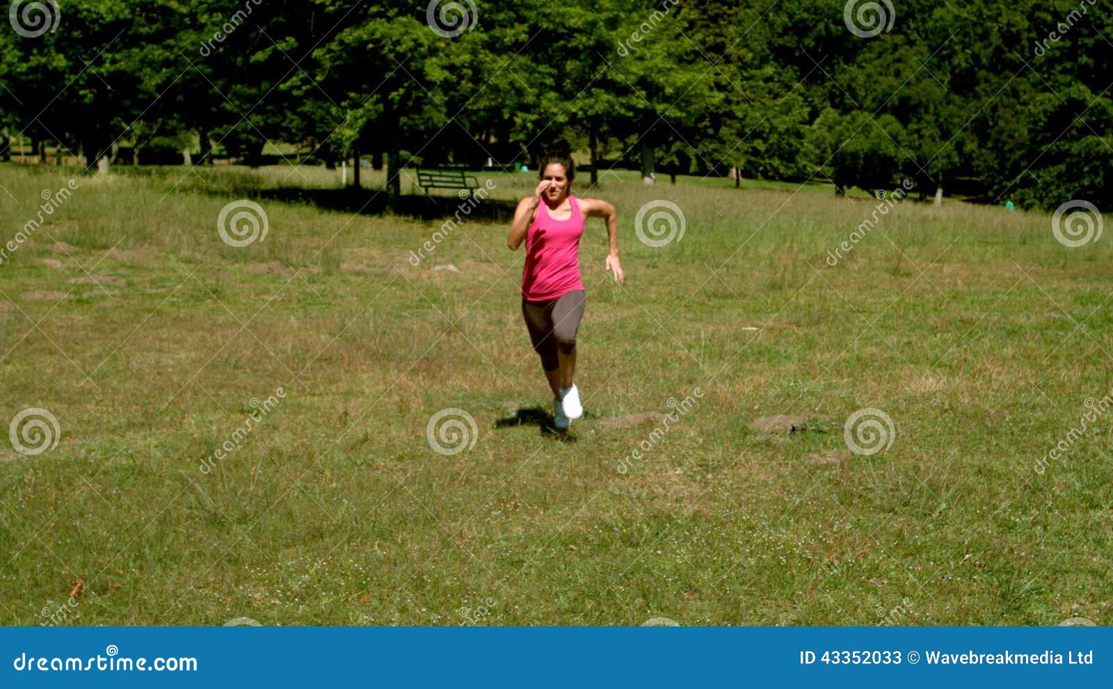 Fit Woman Sprinting Towards Camera Stock Video - Video of green ...