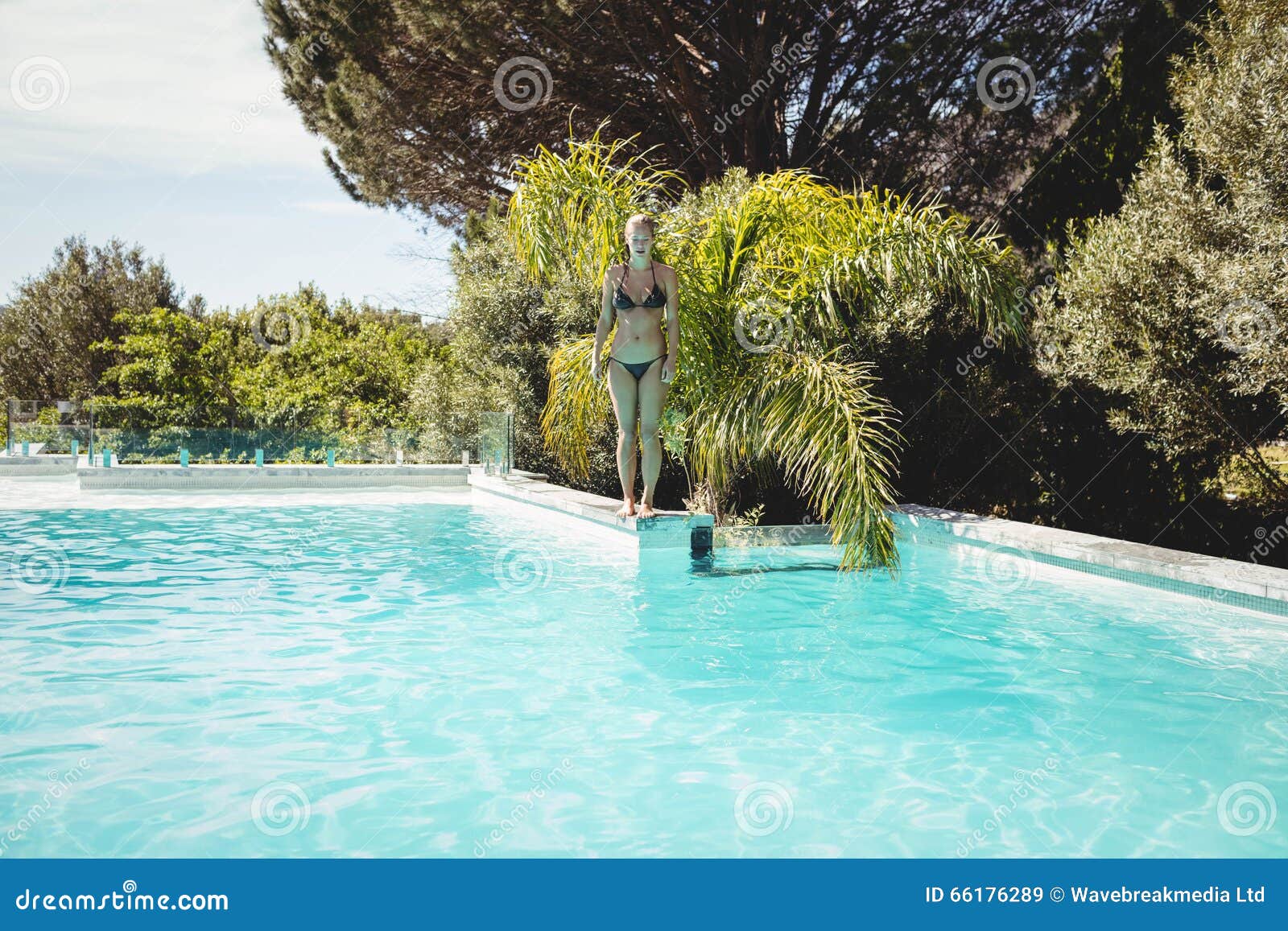 Fit Woman Standing on Pools Edge Stock Image - Image of holiday, beauty ...