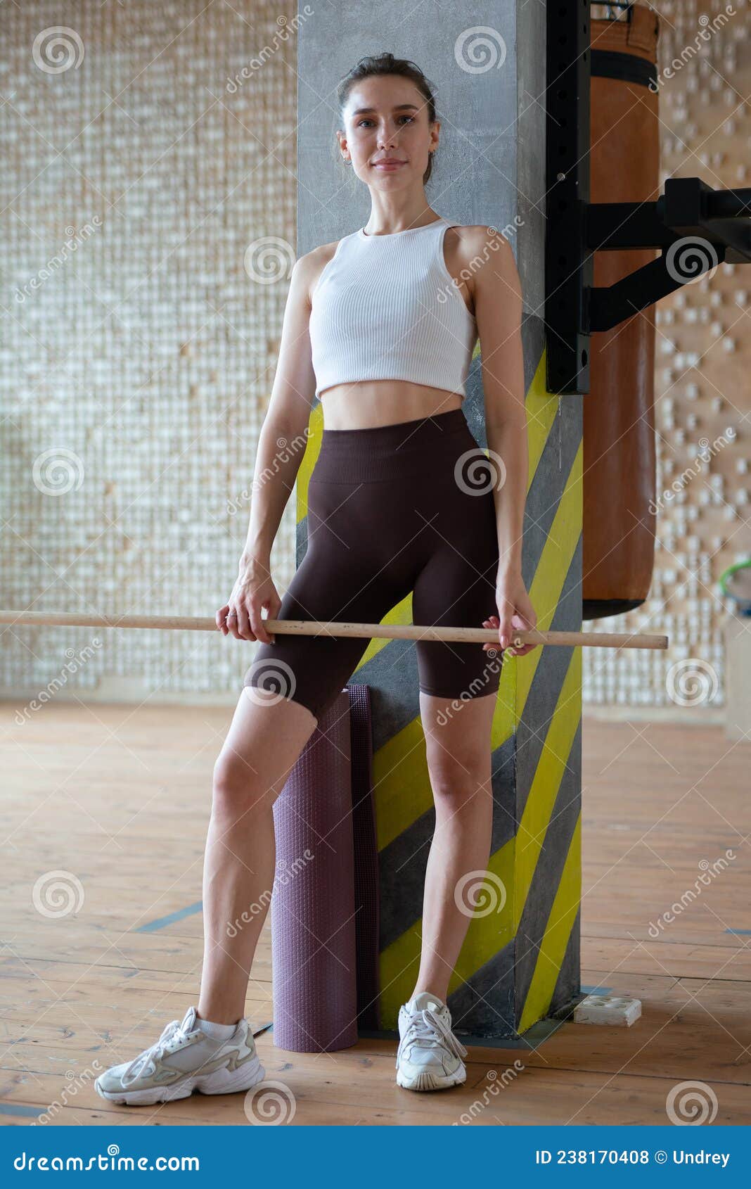 Fit Woman with a Stick Ready To Work Out Stock Photo - Image of sport ...