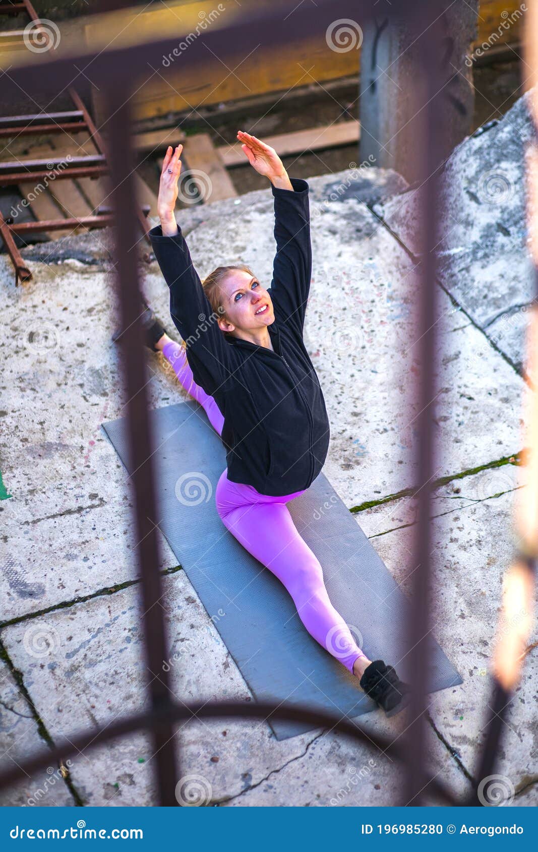 Very Flexible Young Woman Stretching Legs in Split Position Stock Photo ...