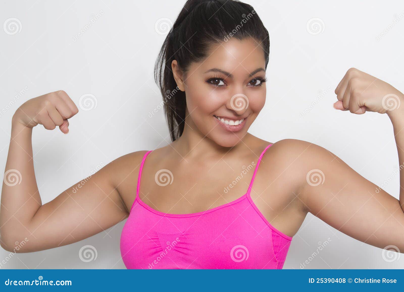Fit young female flexing stock photo. Image of woman - 25390408