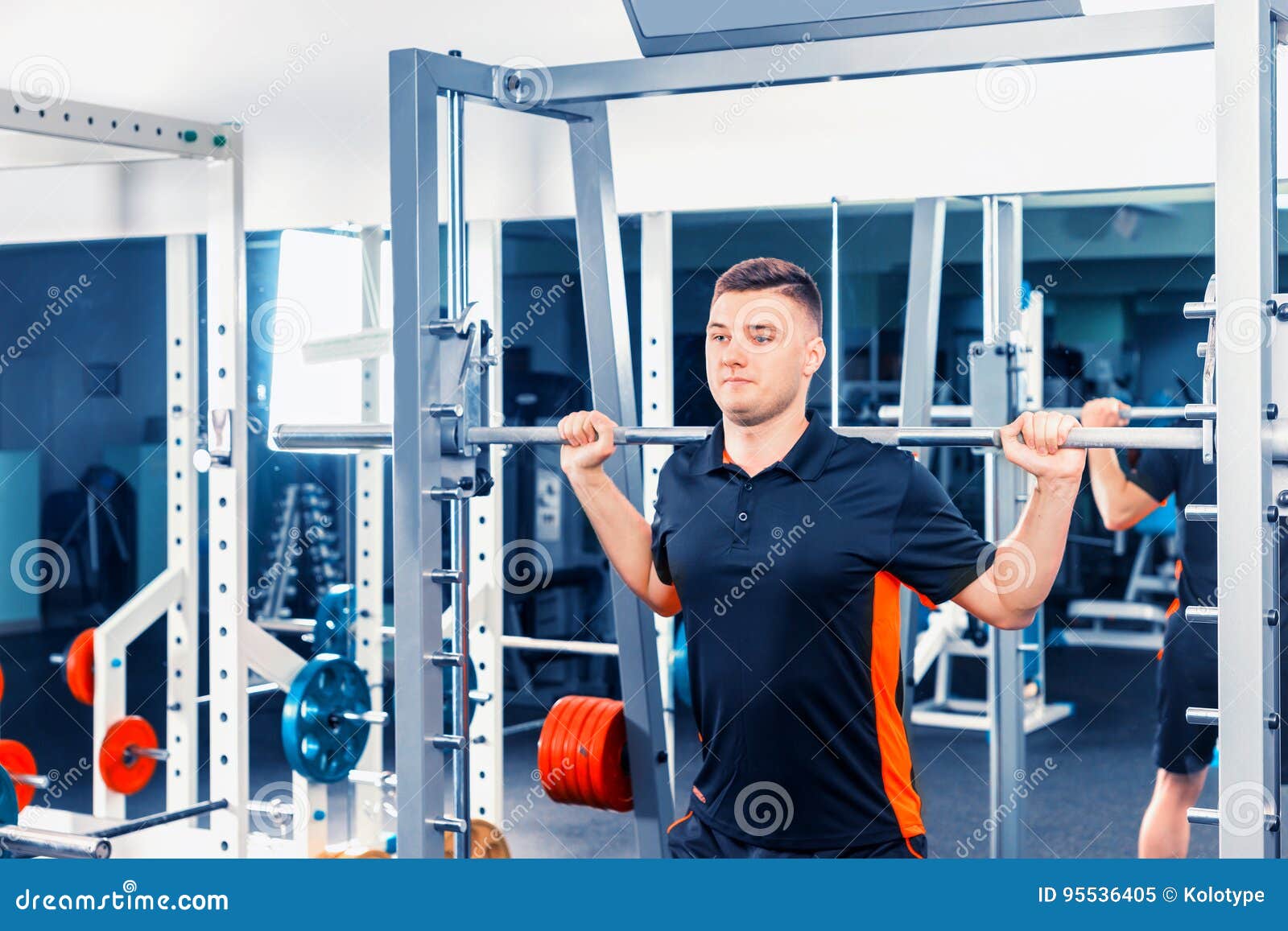 Fit Young Man Lifting Barbells Stock Image - Image of muscular, lifting ...