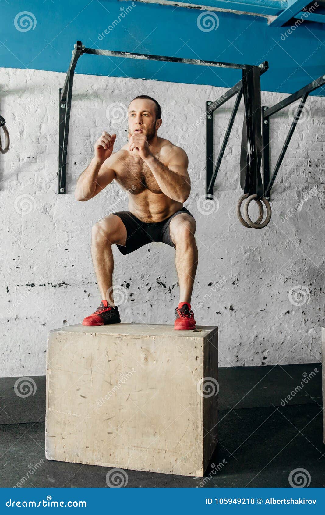 Fit Man Doing Box Jumps in a Gym Stock Photo - Image of fitness, jumps ...