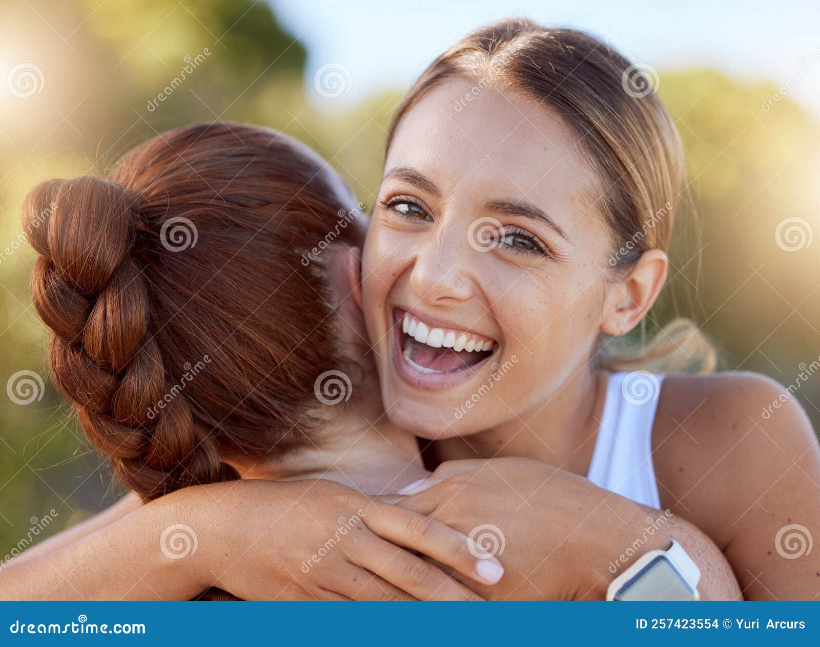 Fitness Athlete And Girl Friends Hug To Celebrate Love Care And