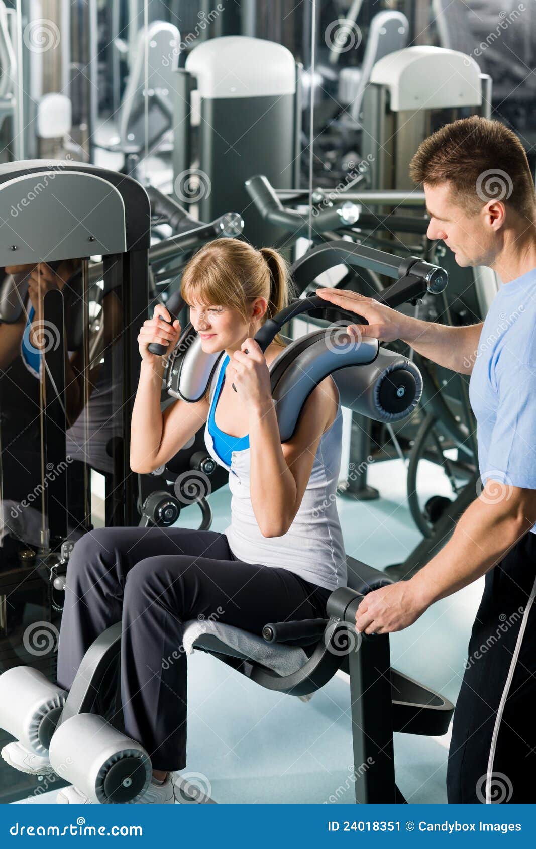 Fitness Center Young Woman Exercise with Trainer Stock Image - Image of ...