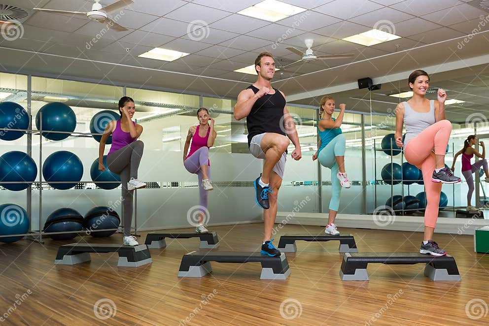 Fitness Class Doing Step Aerobics Stock Image - Image of leisure ...
