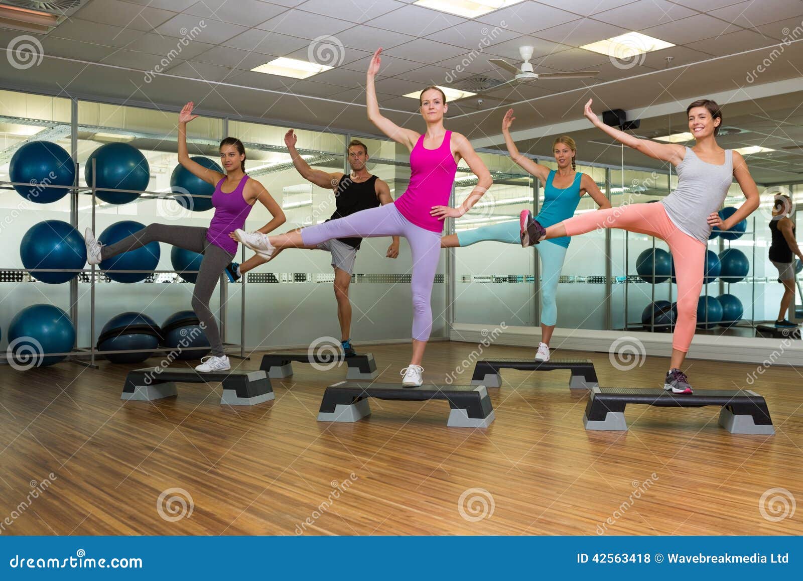Fitness Class Doing Step Aerobics Stock Photo - Image of view, health ...