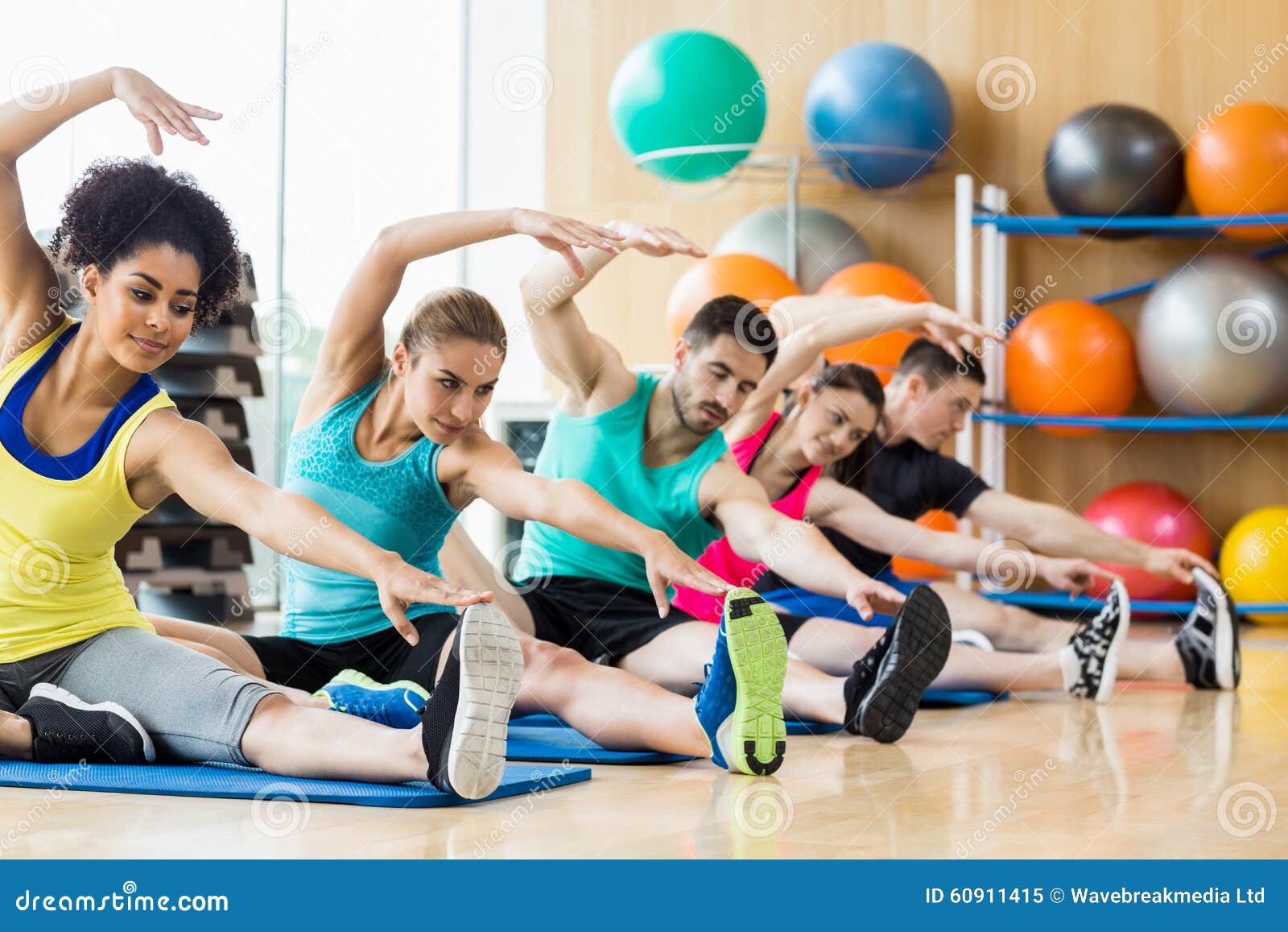 Fitness Class Exercising in the Studio Stock Image - Image of male ...