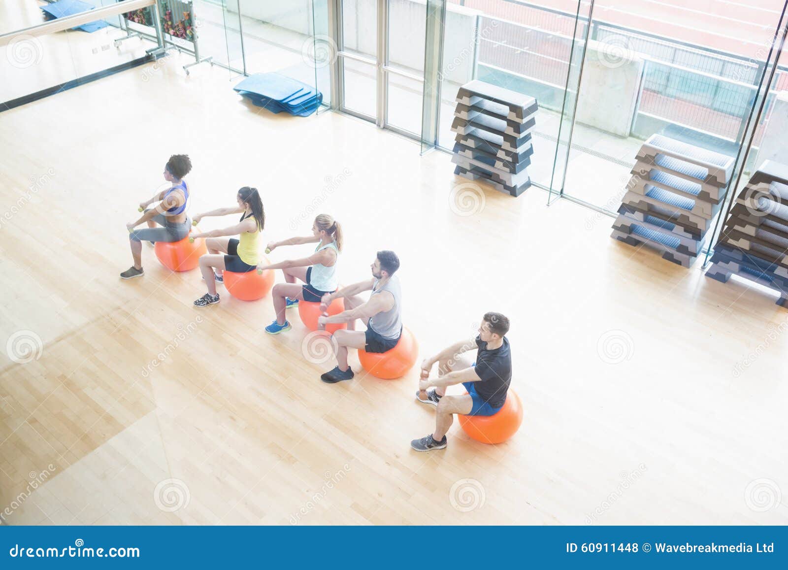 Fitness Class Exercising in the Studio Stock Photo - Image of dumbbell ...