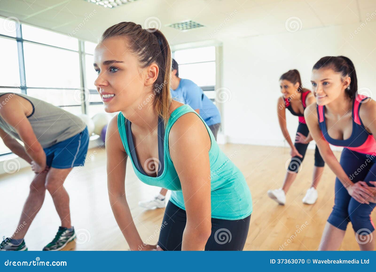 Fitness Class and Instructor Doing Power Fitness Exercise Stock Photo ...