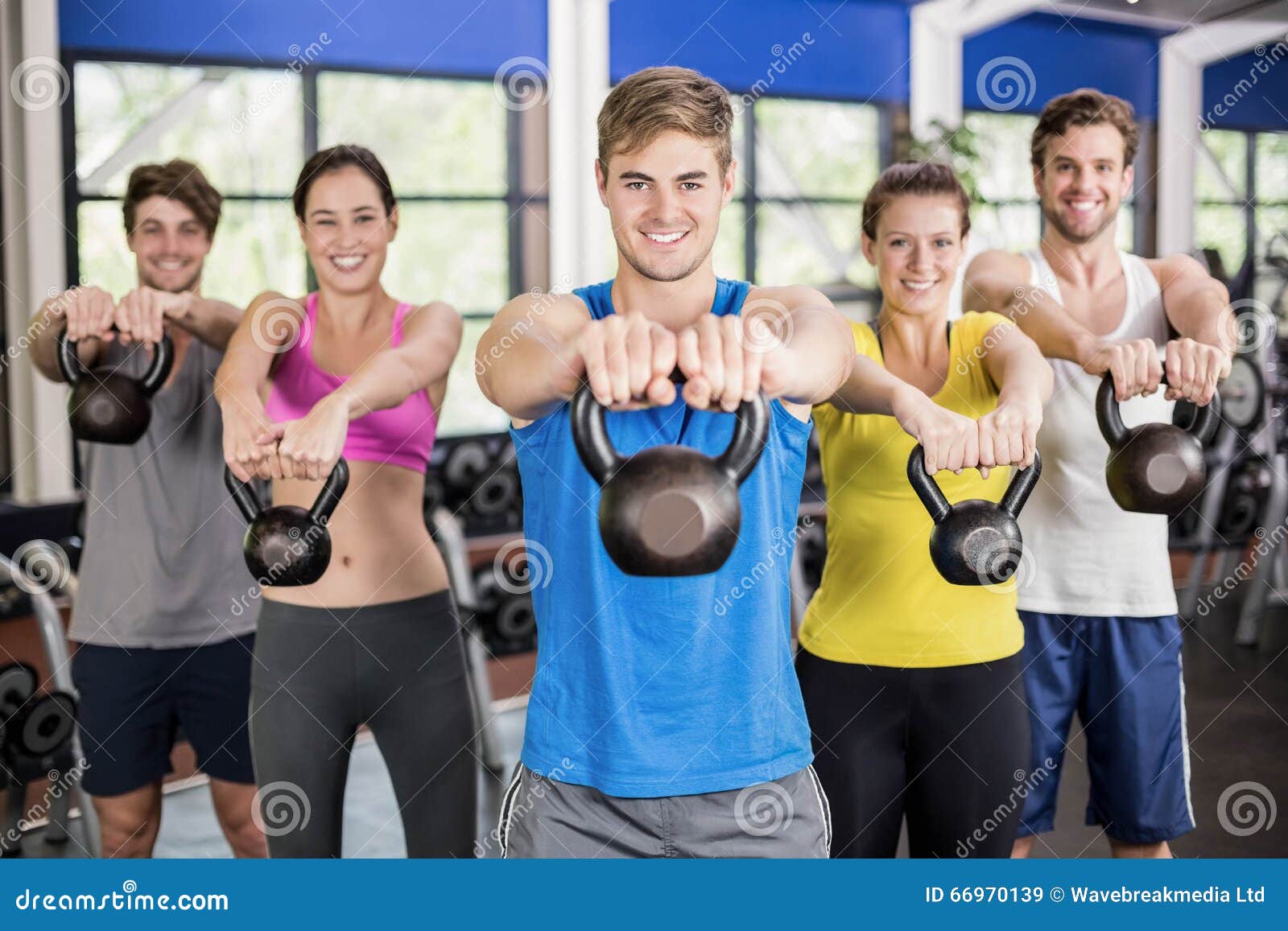 Fitness Class Lifting Dumbbells Stock Image - Image of boot, club: 66970139