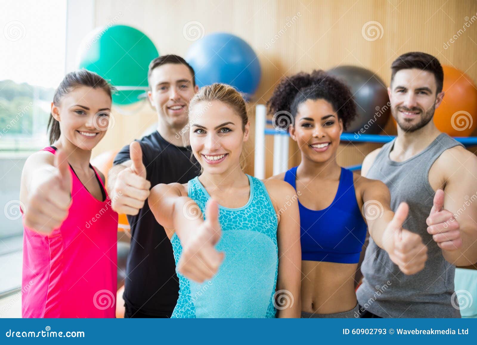 Fitness Class Smiling at Camera in Studio Stock Image - Image of ...