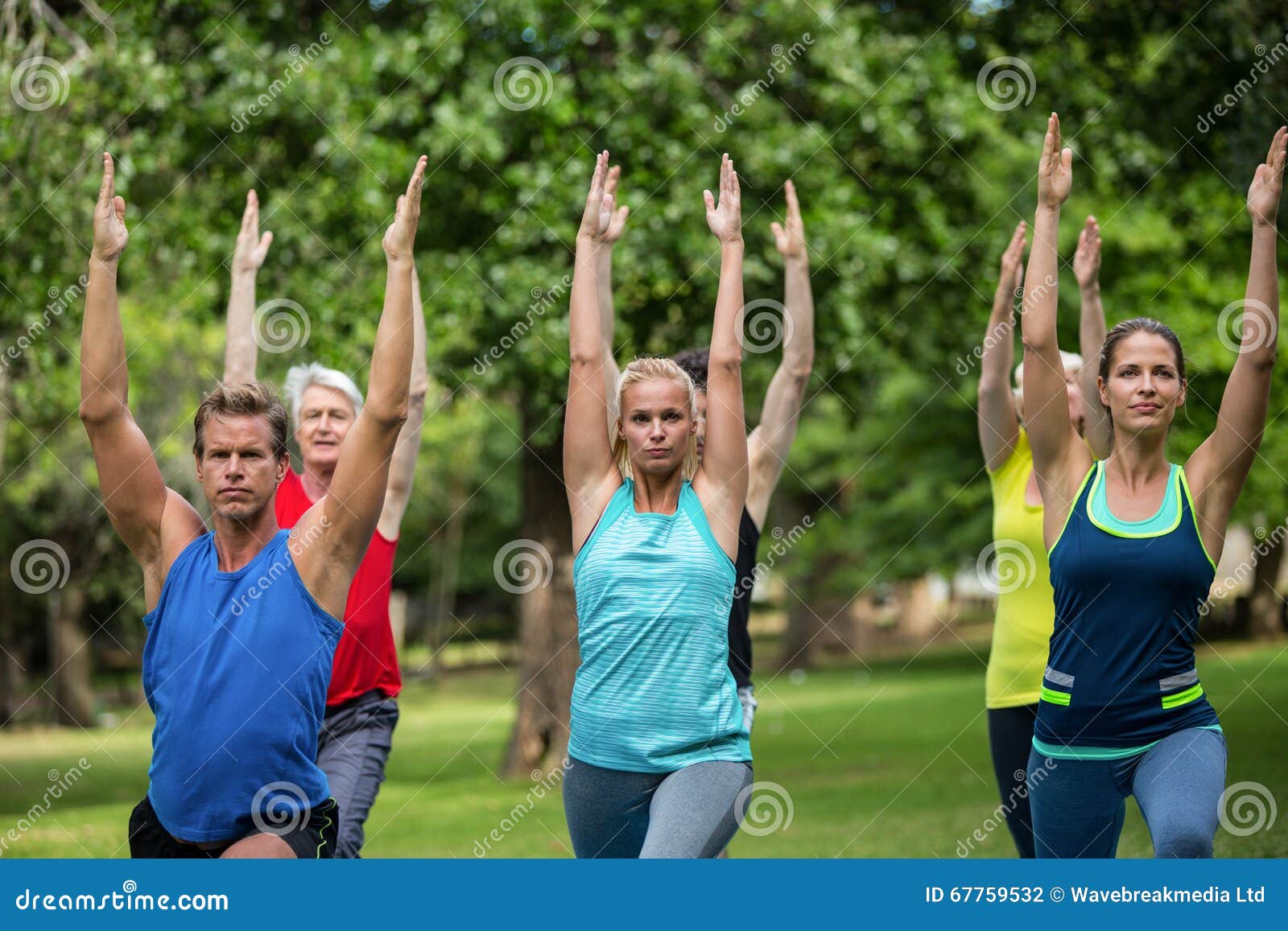 Fitness class stretching stock photo. Image of green - 67759532