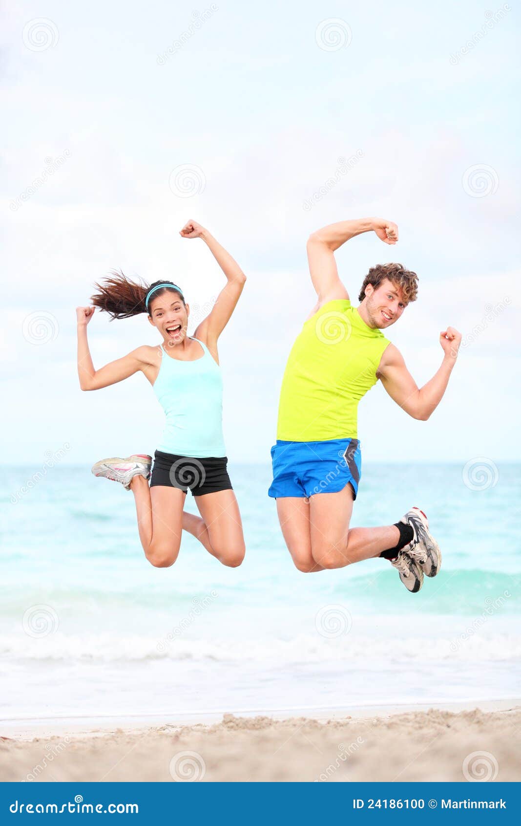 Fitness couple jumping fun stock photo. Image of fitness - 24186100
