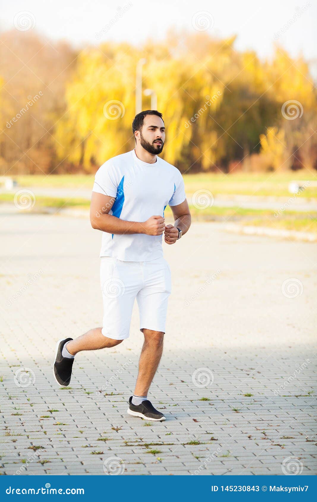 Fitness. Exhausted Runner Man Resting on the Park after Workout Stock ...