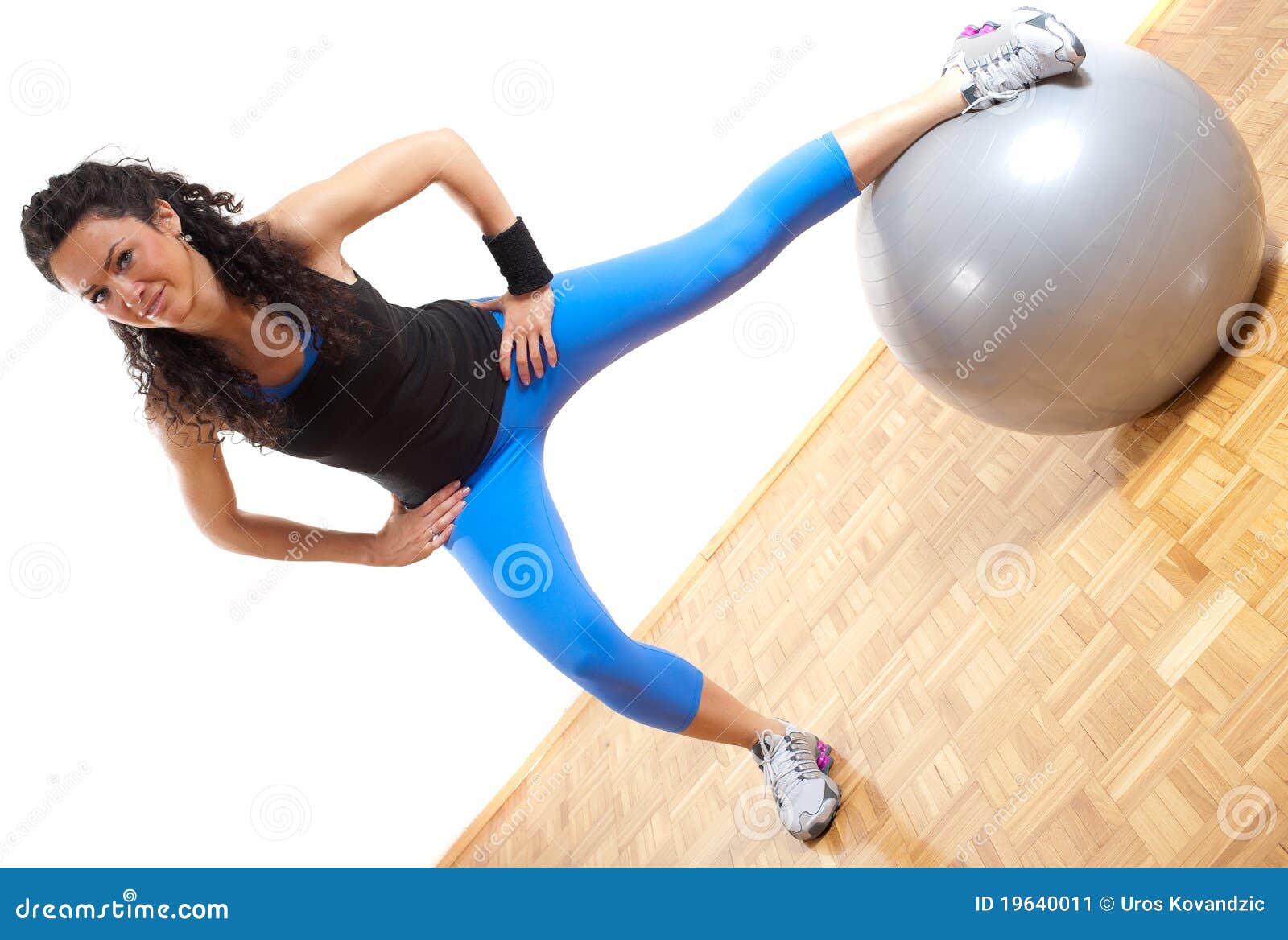 Fitness girl with ball stock image. Image of isolated - 19640011
