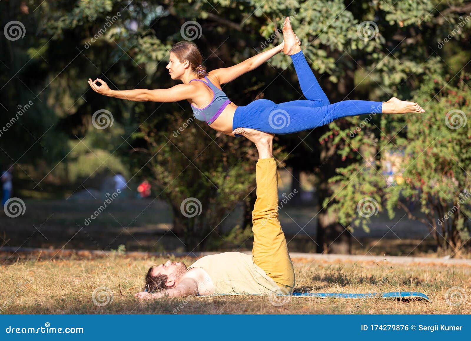Girl Doing Yage Dancer Pose on Acroyoga Practicing Stock Photo - Image ...
