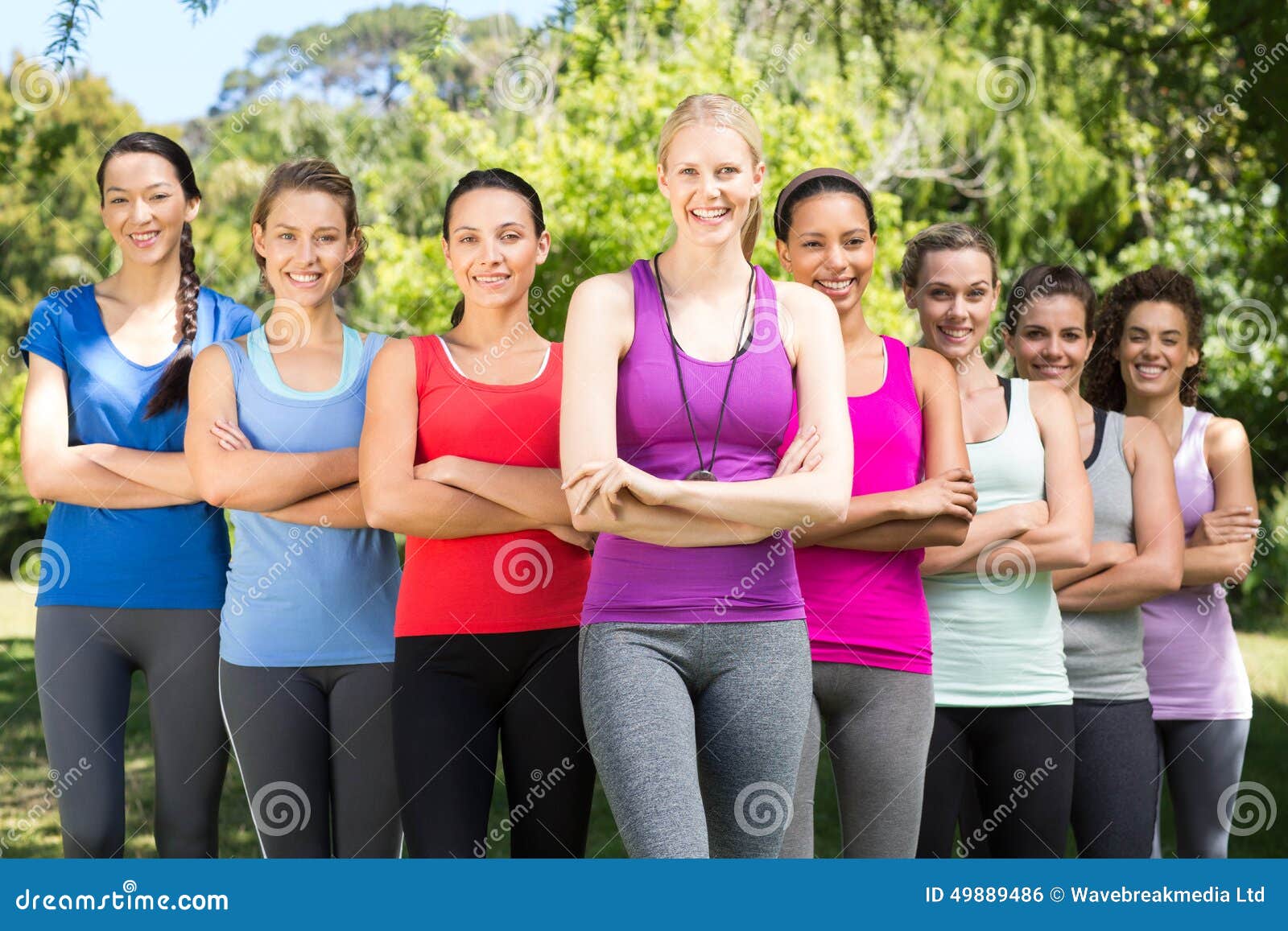 Fitness Group Smiling at Camera in Park Stock Photo - Image of athletic ...