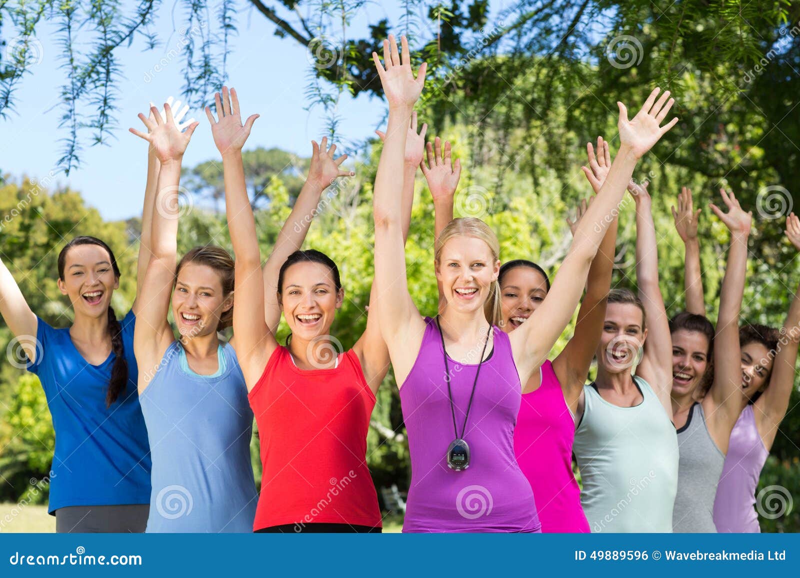 Fitness Group Smiling at Camera in Park Stock Photo - Image of body ...