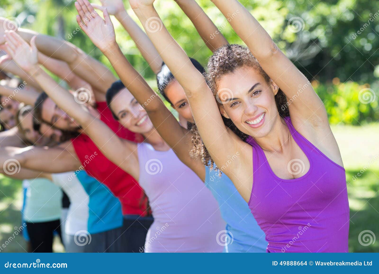 Fitness Group Warming Up in Park Stock Photo - Image of people, health ...