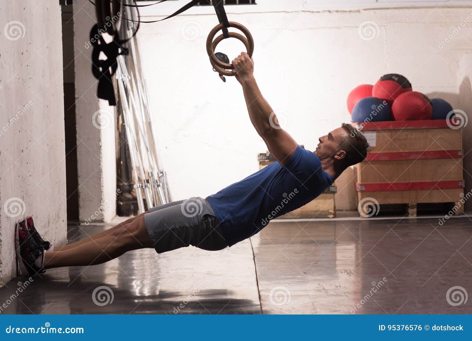 Man doing dipping exercise stock photo. Image of portrait - 95376576