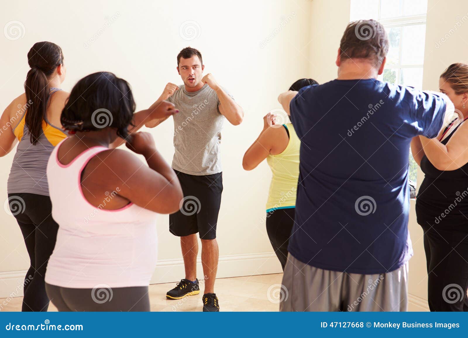 Fitness Instructor in Exercise Class for Overweight People Stock Photo ...