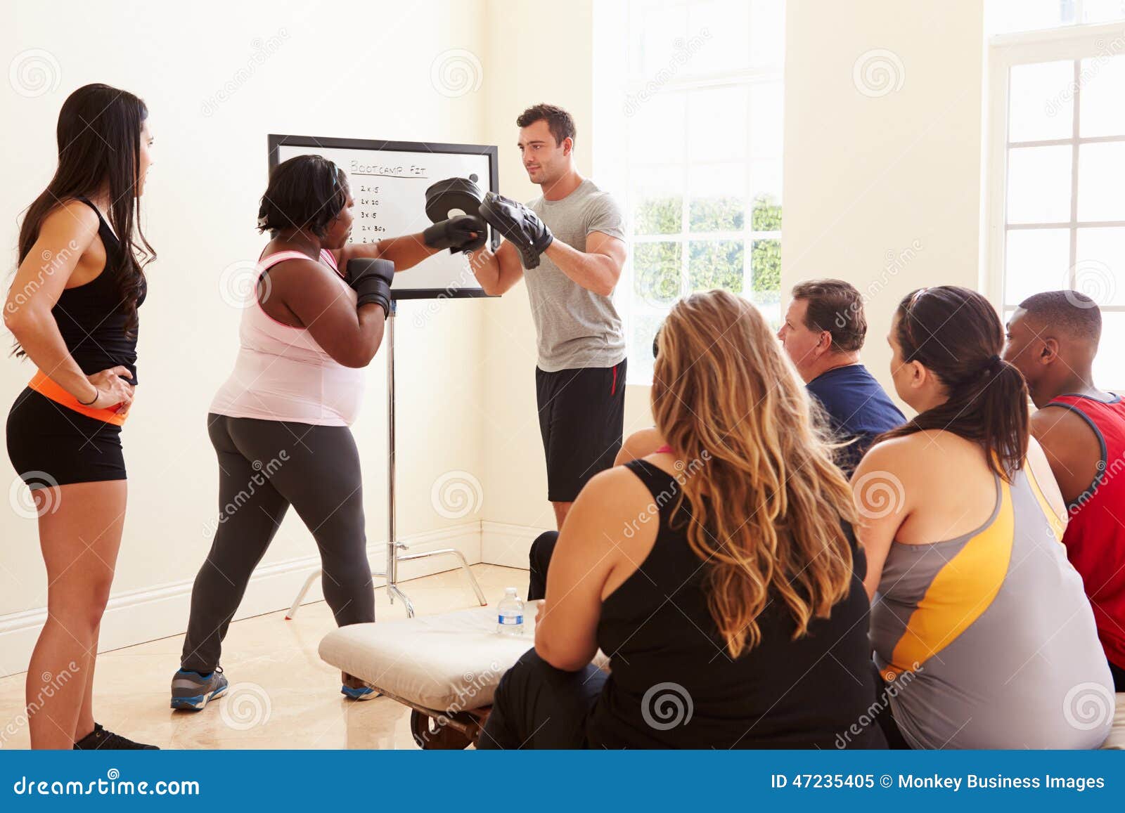 Fitness Instructor in Exercise Class for Overweight People Stock Image ...