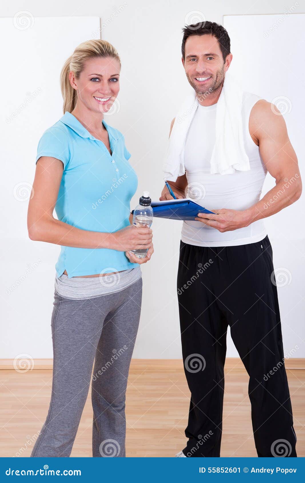 Fitness Instructor Taking Notes after a Session Stock Image - Image of ...