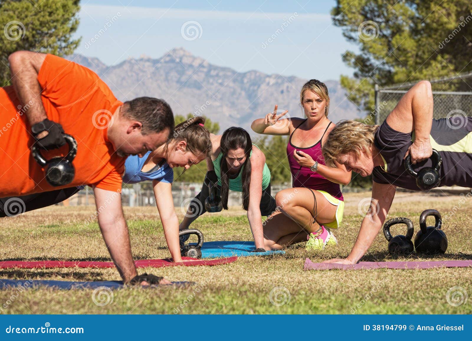 Fitness Instructor Teaching Mature Group Stock Image - Image of ...