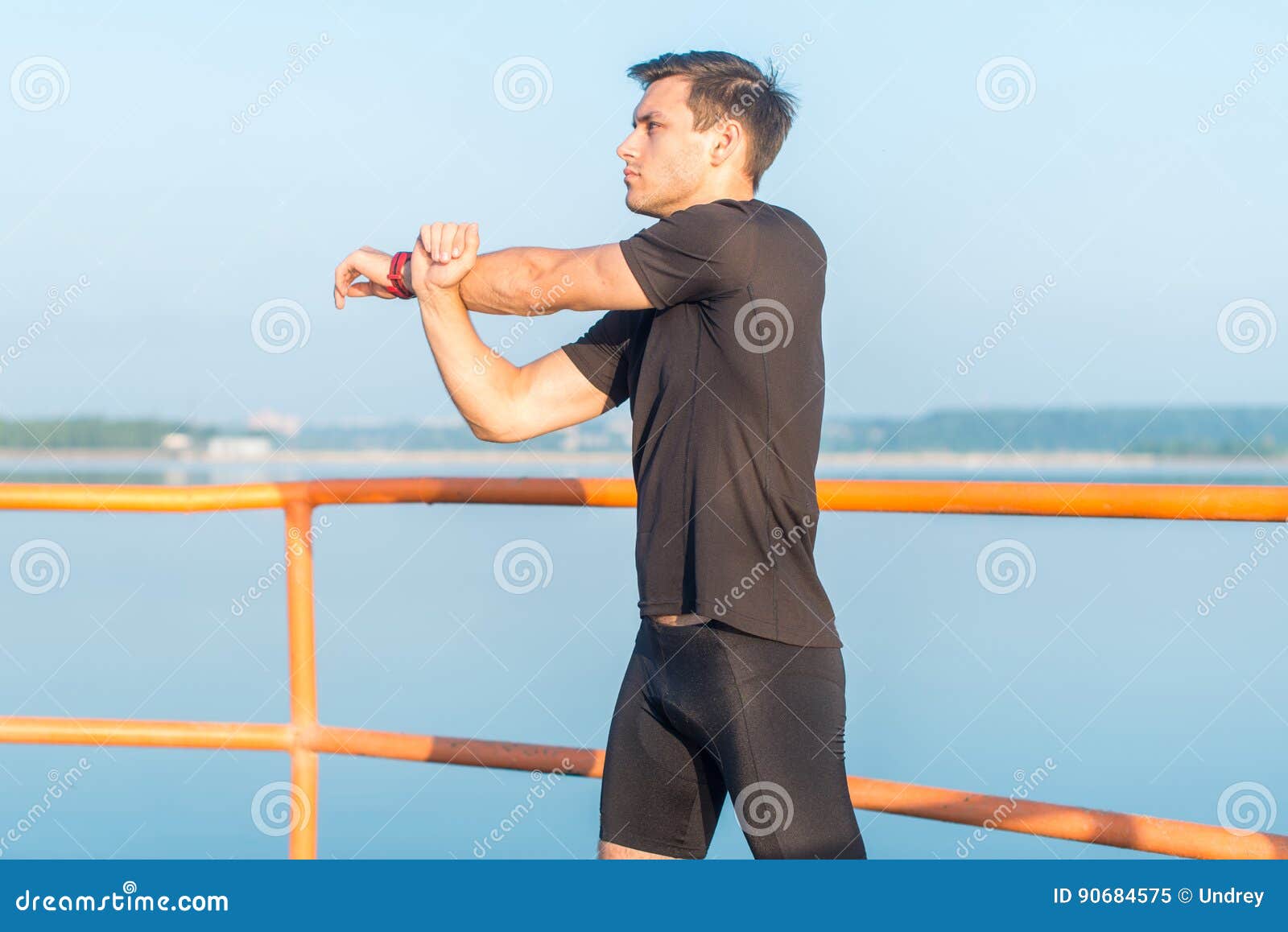 Fitness Man Stretching Arms, Shoulder. Runner Warming Up and Exercising ...