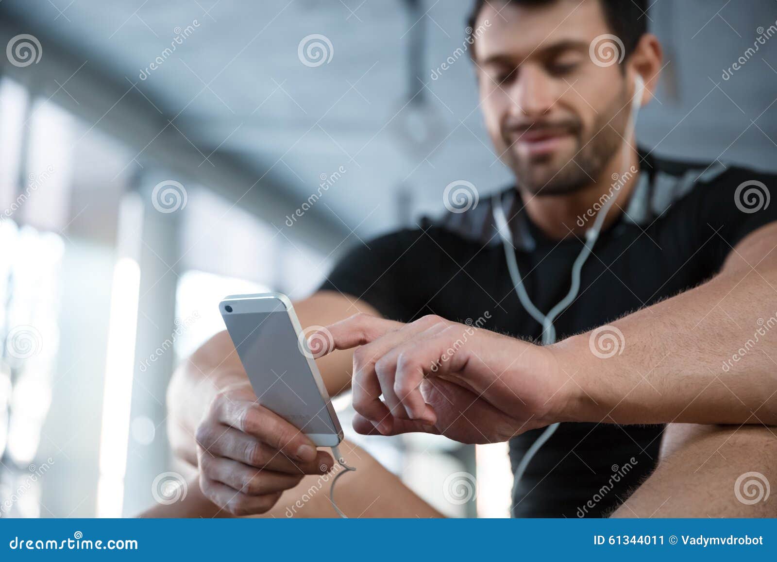 Fitness Man Using Smartphone in Gym Stock Image - Image of ...