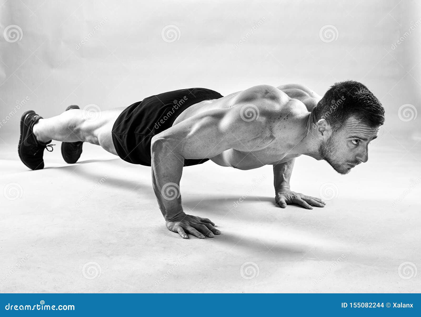 Fitness Model Doing Pushups Stock Photo - Image of studio, strong ...