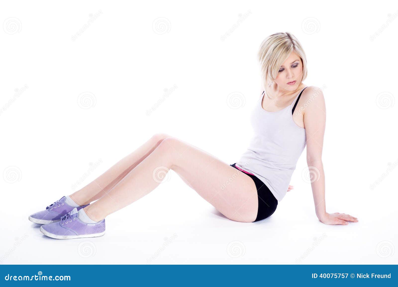Fitness Model Sitting on Floor Stock Image - Image of person, people ...