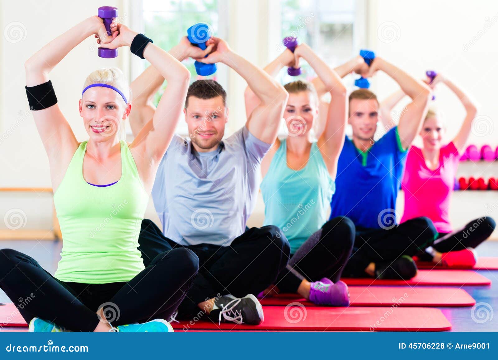Fitness People in Gym Working Out with Dumbbells Stock Photo - Image of ...