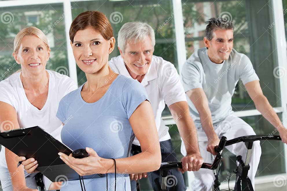 Fitness Trainer Coaching Spinning Stock Photo - Image of club, analysis ...