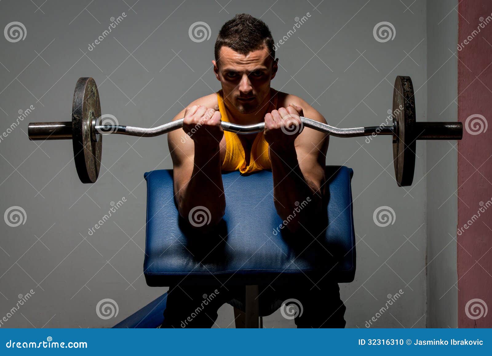 Fitness Trainer Doing Heavy Weight Exercise for Biceps Stock Photo ...