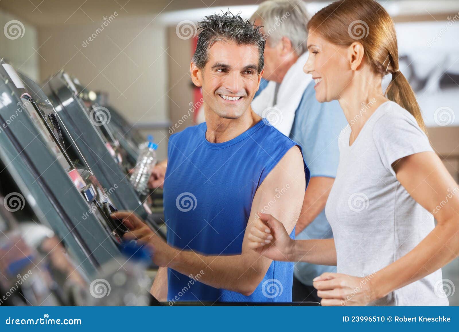 Fitness trainer explaining stock photo. Image of caucasian - 23996510
