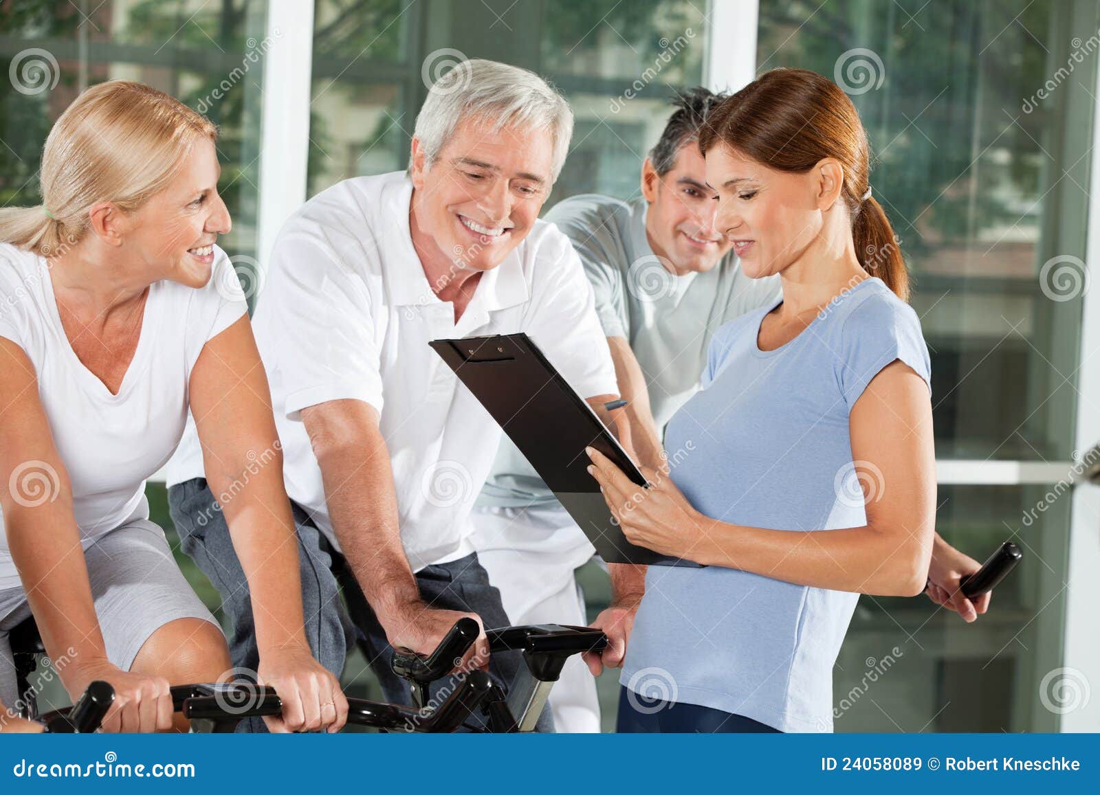 Fitness Trainer Talking To Senior Stock Image - Image of coach ...