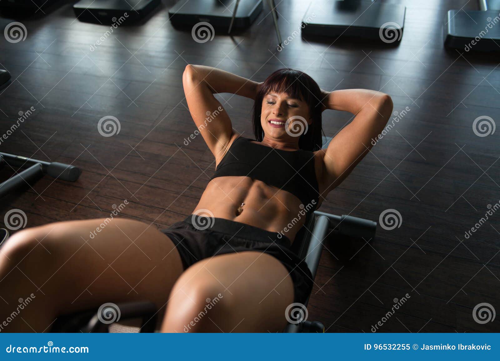 Young Woman Doing Abdominal Exercise In Gym Stock Image Image Of