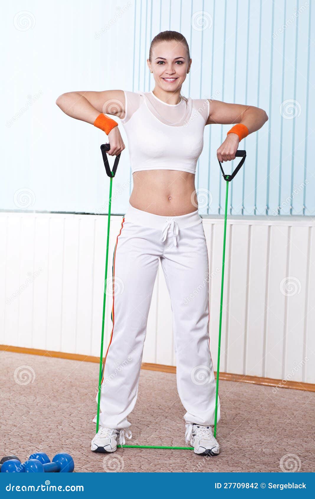 Fitness Woman Doing Exercise with Expander Stock Photo - Image of ...