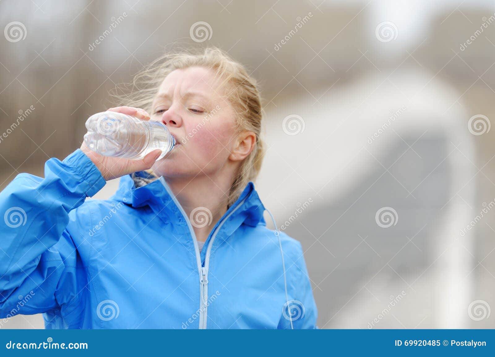 Fitness Woman Drinking Water after Beach Running. Stock Image - Image ...