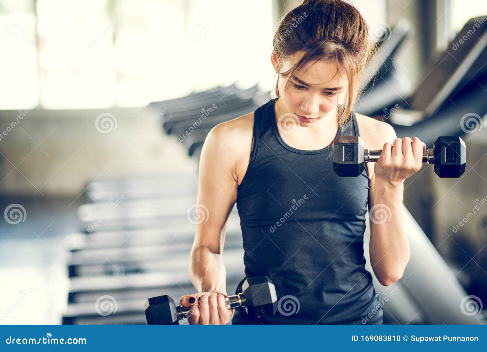 Fitness Woman in Training Exercises with Dumbbells Stock Photo - Image ...