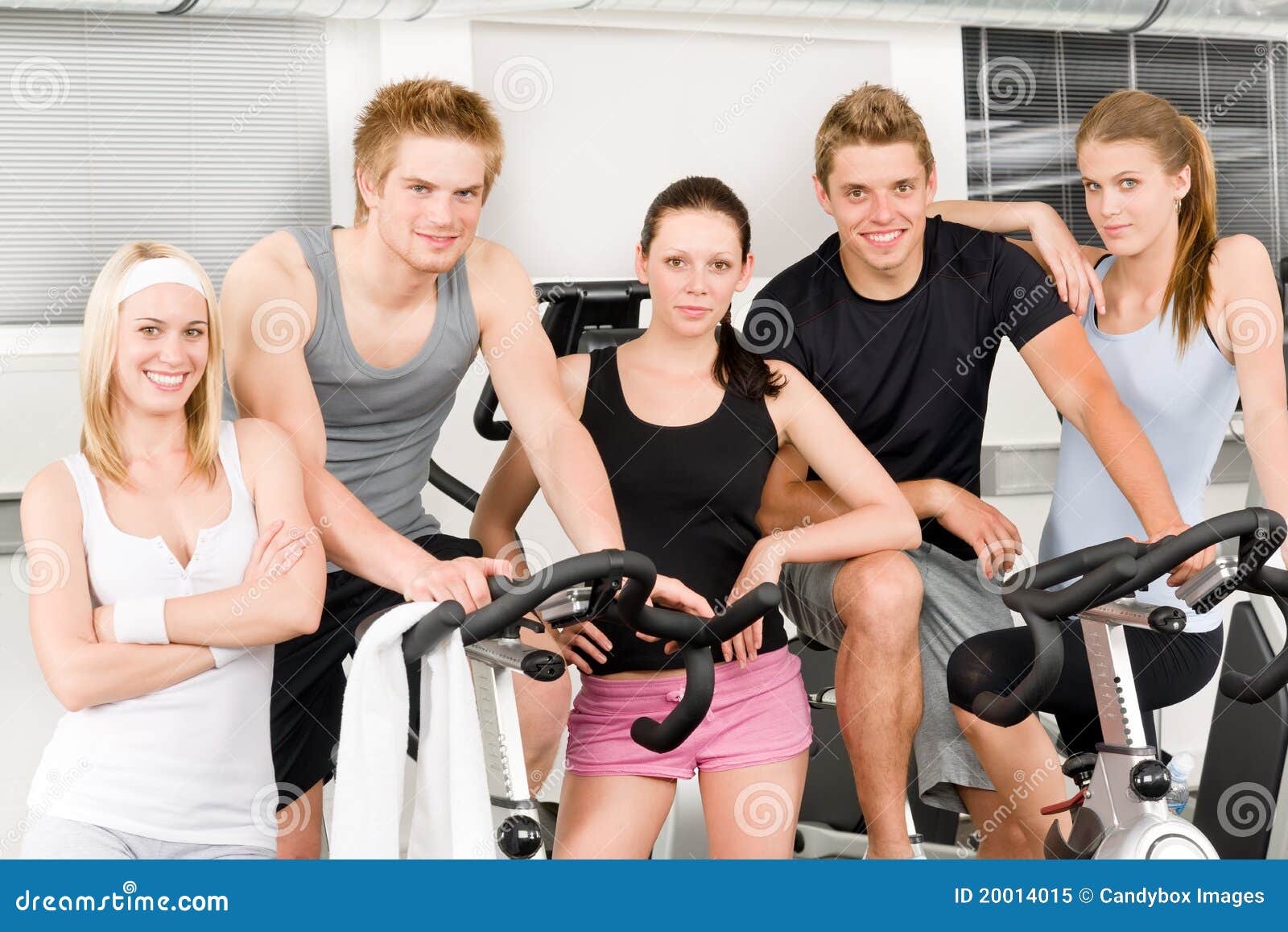 Fitness Young Group People at Gym Bicycle Stock Image - Image of ...