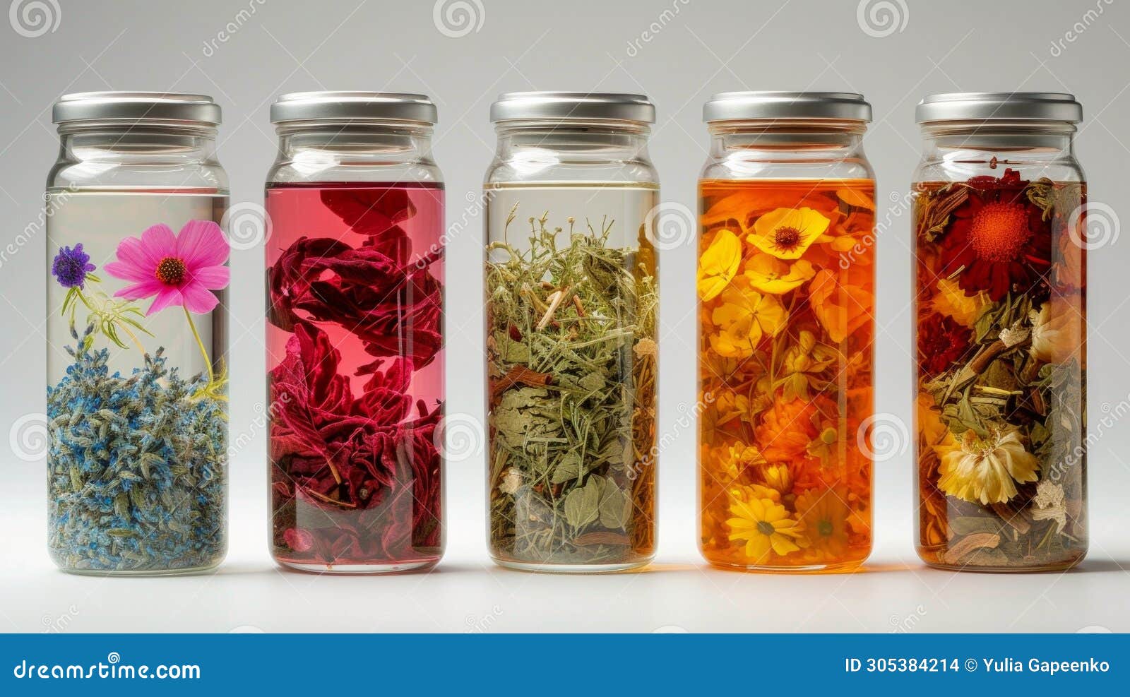 Five Beautiful Glass Jars with Tea Standing in a Row Stock Photo ...