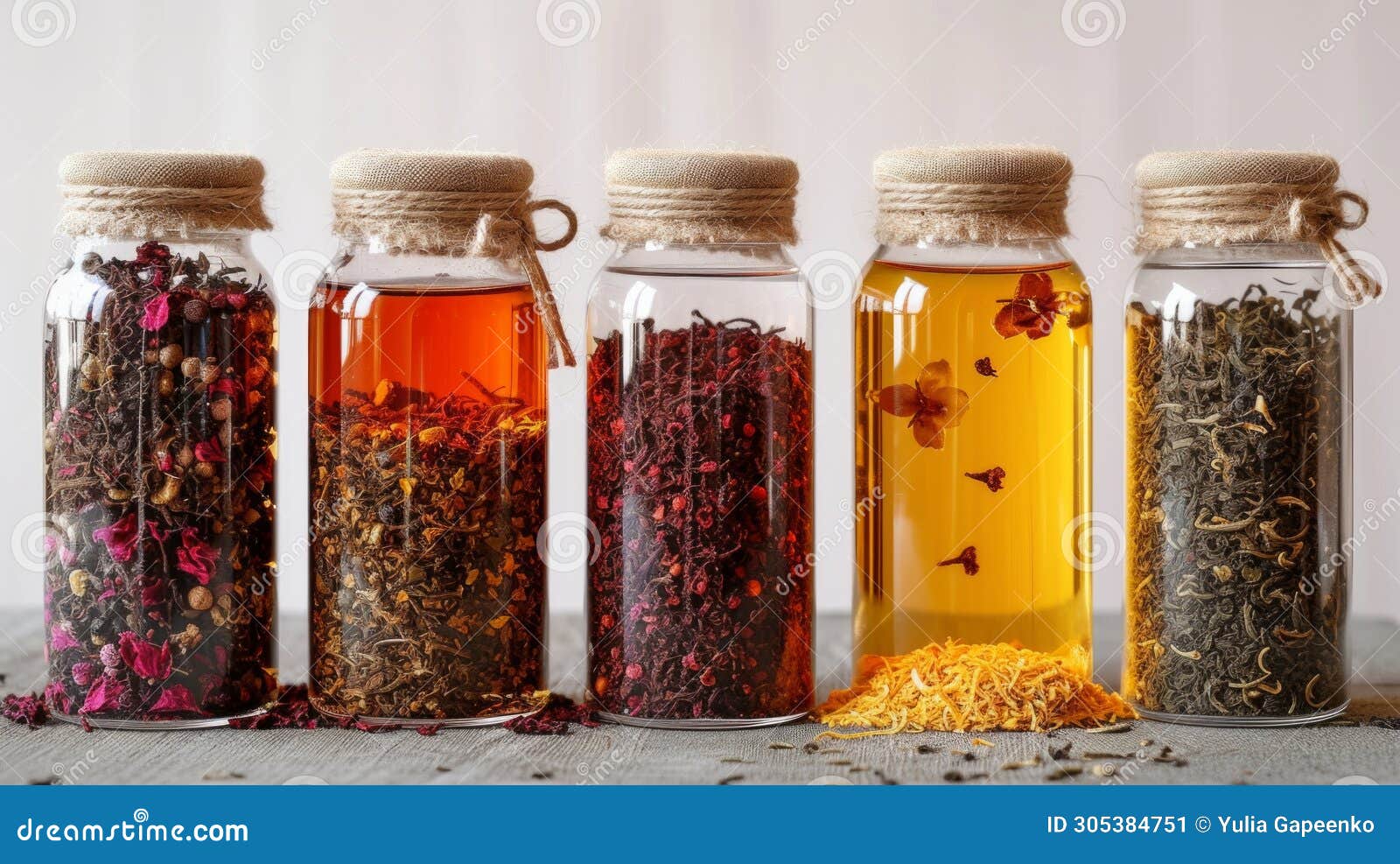 Five Beautiful Glass Jars with Tea Standing in a Row Stock Image ...