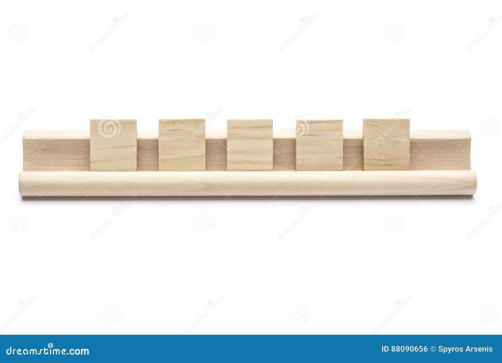 Five Blank Scrabble Tiles On A Wooden Rack Stock Photo | CartoonDealer ...