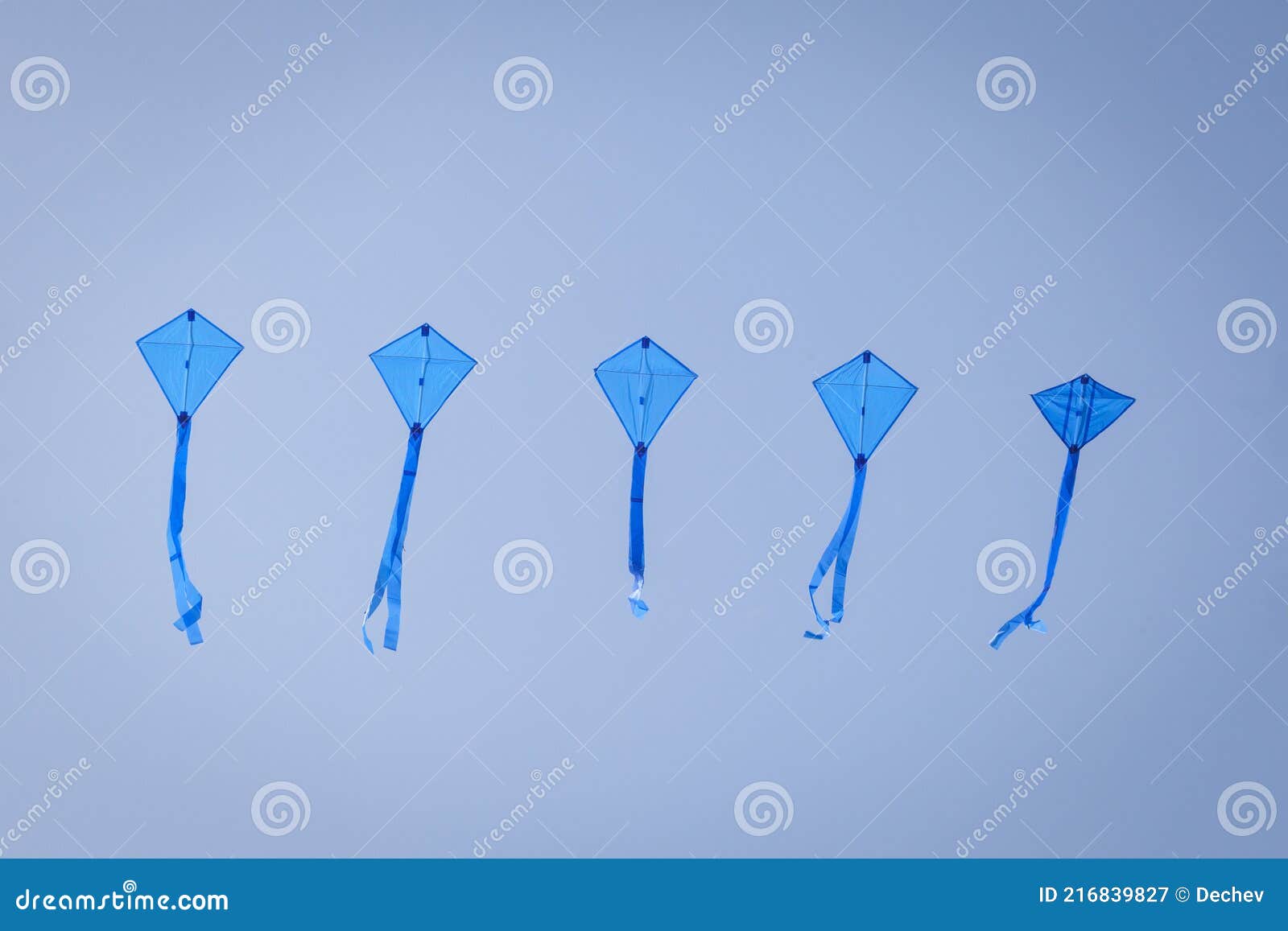 Five Blue Kites Flying in a Beautiful Blue Sky Stock Image - Image of ...